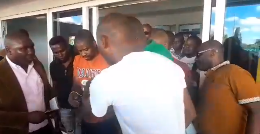 Murder Suspect Peter Dube Arrested Upon Arrival, Accused of Identity ...